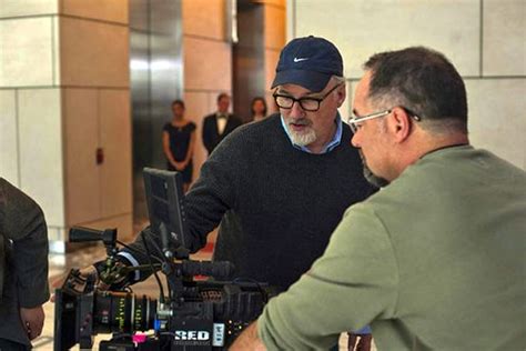 Director David Fincher Looks On A Playback Monitor On The Set Of The