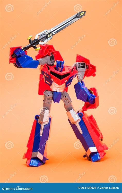 Robot Transformer Red And Blue On An Orange Background Toys For