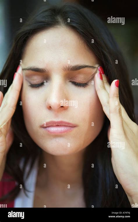 Frustrated Woman Rubbing Her Temples Stock Photo Alamy