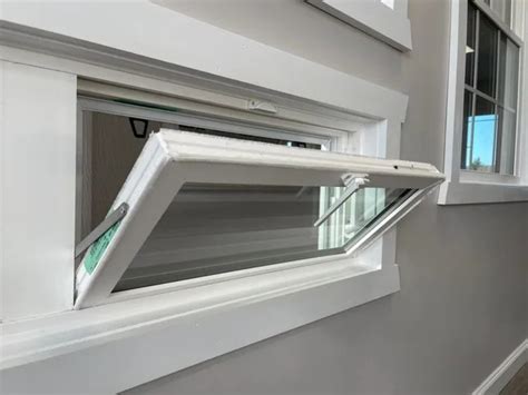 Custom Basement Hopper Windows Enhance Light And Ventilation In Your Space