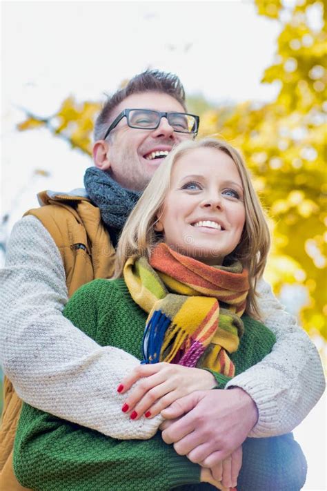 Handsome Man Embracing His Girlfriend Lying On The Bed Passionate