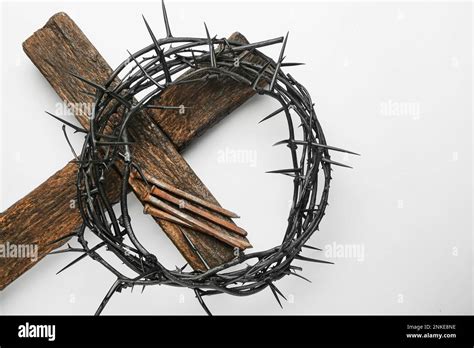 Crown Of Thorns Nails And Wooden Cross On White Background Stock Photo Alamy