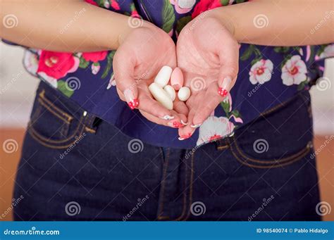 Close Up Of A Woman Hand Holding In Her Open Hand A Soft Gelatin