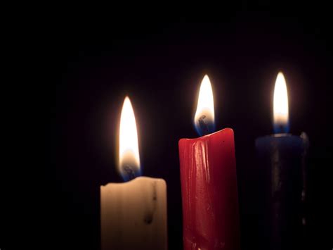 Three Candles On A Black Background Copyright Free Photo By M Vorel