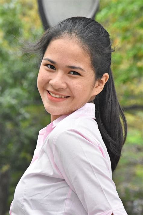 Smiling Beautiful Diverse Girl Wearing Pink Shirt Portrait Stock Image