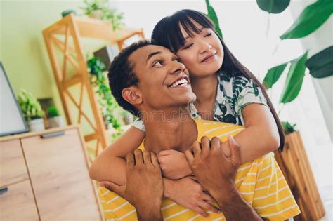 Photo Of Cute Pretty Couple Wear T Shirts Weekend Time Together Indoors