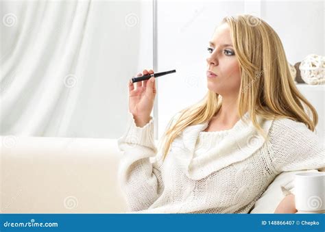 Beauty Girl Indoors With E Cigarette Vapetrendy New Vaping Device