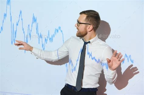 Stock Market Trader Working Investment Charts Graphs Ticker Diagrams Projected On His Face