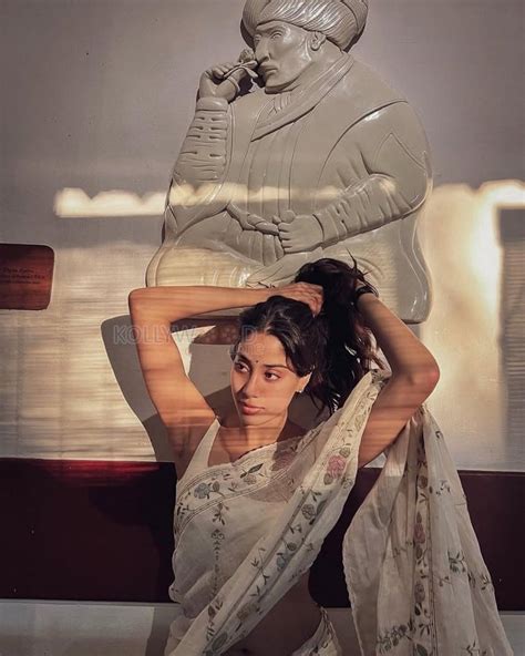 Beautiful Janhvi Kapoor In A White Saree With Sleeveless Blouse Photos
