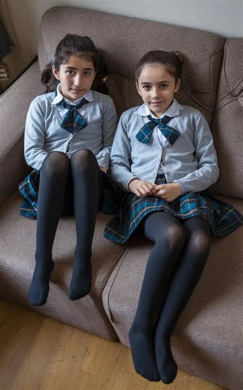 Two Turkish Schoolgirls In Uniform Relaxing On A Sofa Ai Art Generator