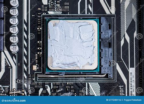 AMD CPU With Thermal Paste In A AM CPU Socket On A Computer