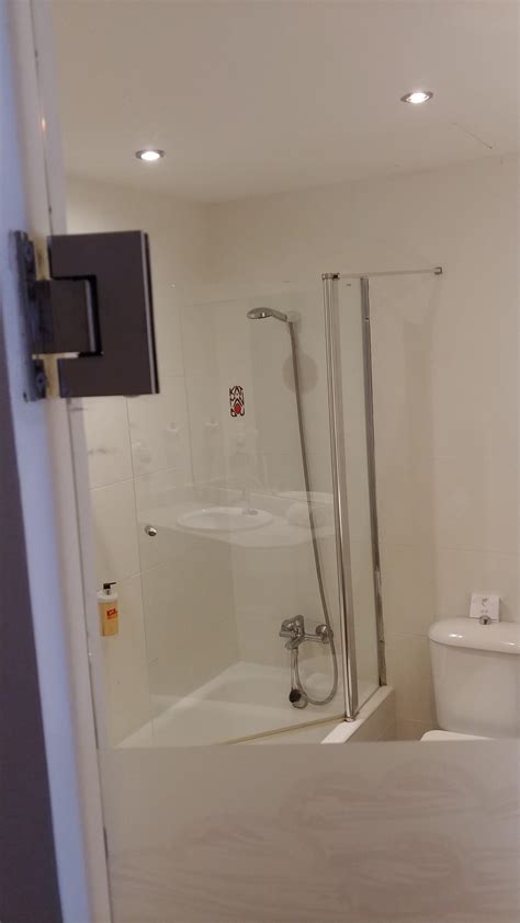 This Bathroom With A Seethrough Entrance In An Hotel Rcrappydesign