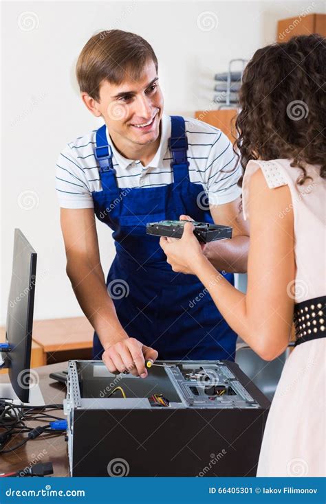 technical engineer upgrading hardware of client computer stock image