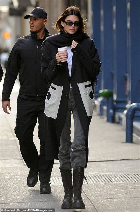Kendall Jenner Flashes A Smile As She Strolls In Nyc With A Cup Of Coffee In Hand Daily Mail