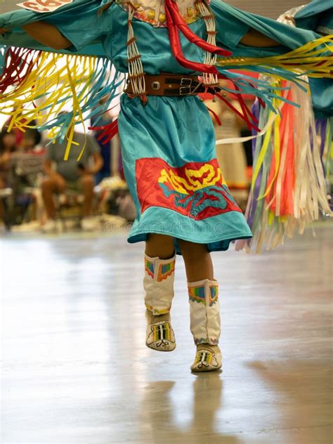 Pre Teen Girl With Turquoise Dress And Fancy Ribbon Shawl Dancing At A