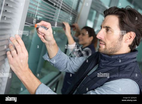 Installing Window Blinds Hi Res Stock Photography And Images Alamy
