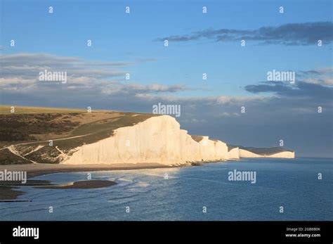 Early Evening Sunlight Bathes The Famous Seven Sisters Chalk Cliffs On