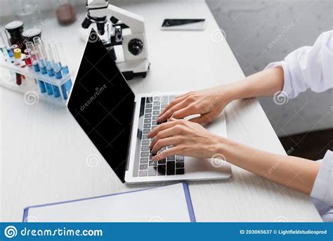 Cropped View Of Scientist Typing On Stock Image Image Of Laboratory