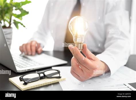 Business Creative Idea Concept Businessman Holding Light Bulb Stock Photo Alamy