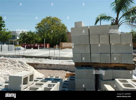 Stack Of Light Gray Slightly Textured Surface Concrete Blocks Aka Cinder Blocks Or Concrete