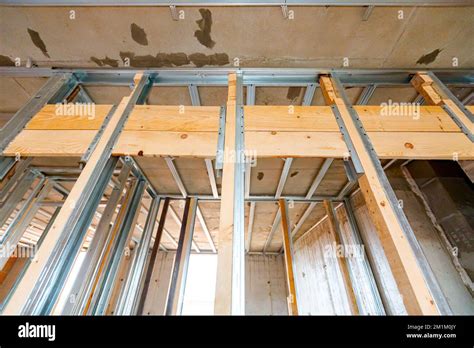 View At Framework Of Metal And Wooden Vertical Profile Pillars For Mounting Partition Wall And