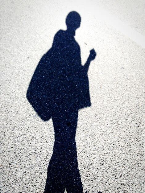 Premium Photo Shadow Of Man On Wall