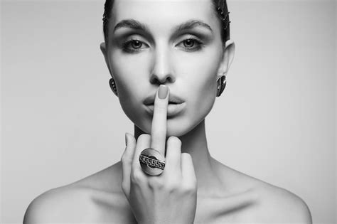 Premium Photo Beautiful Girl Showing Finger With Ring