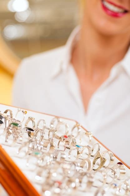 Premium Photo Shop Assistant At The Jeweler