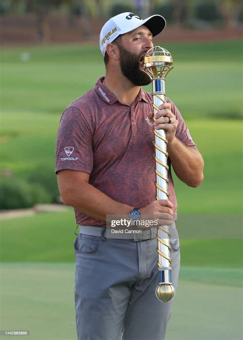 Jon Rahm Of Spain Poses With The Dp World Tour Championship After The