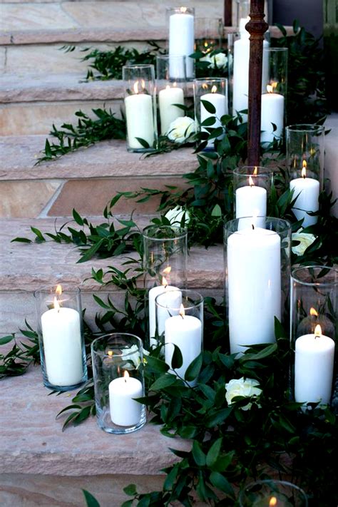 Pillar Candles And Greenery On Stairs In 2020 Wedding Pillars Pillar