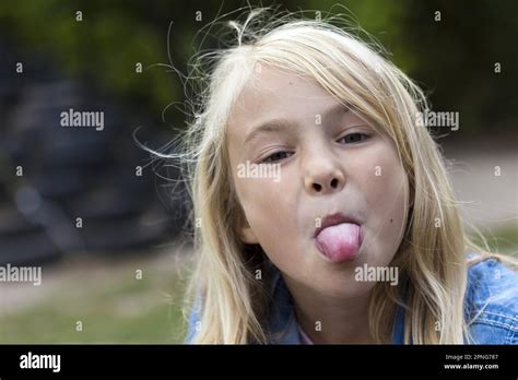 Girl 10 Sticks Out Her Tongue Kiel Schleswig Holstein Germany