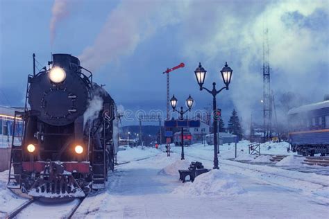 Retro Steam Locomotive Stands By The Station Platform Stock Image