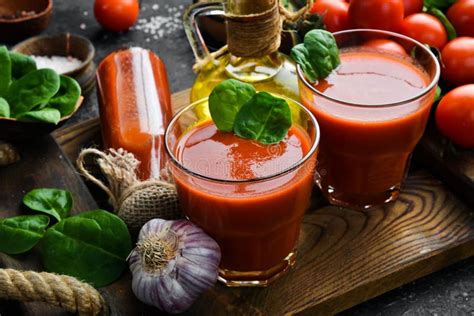 Homemade Tomato Juice With Salt And Spices In Glasses Side View Stock