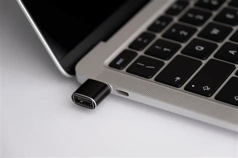 Premium Photo Old Usb To Typec Adapter In A Modern Laptop