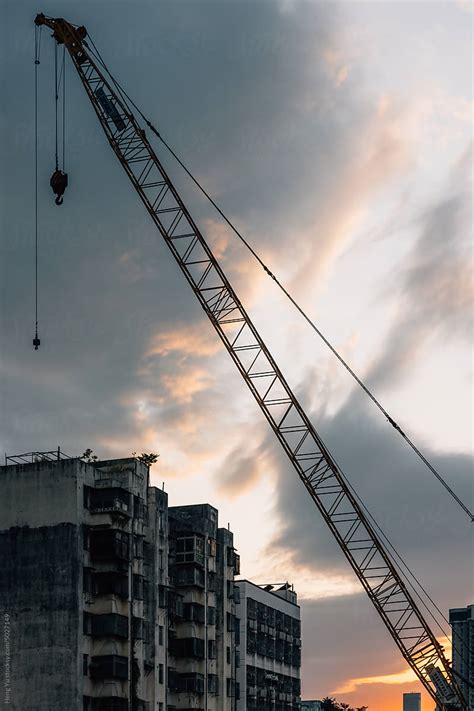 Tower Crane And Building By Stocksy Contributor Heng Yu Stocksy