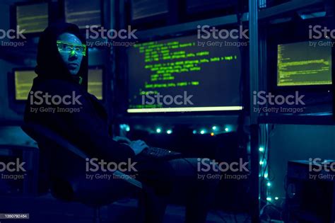 cyber hacker breaks into databases to obtain information using a