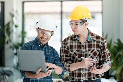 Two Engineers Discussion And Planning About Project Brainstorming Of