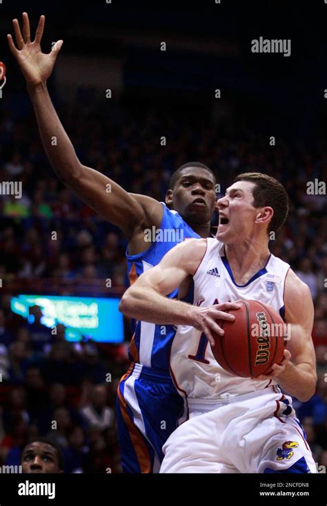 Kansas Guard Tyrel Reed 14 Drives The Lane Against Texas Arlington