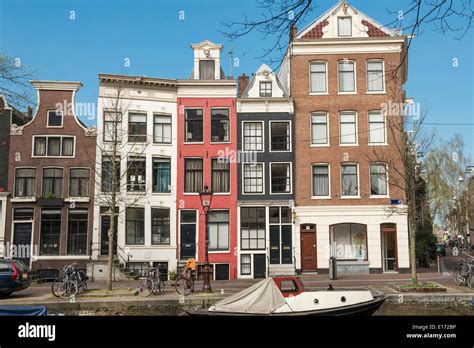 The Typical Dutch Houses On A Blue Spring Day Amsterdam Netherlands