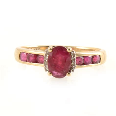 Lot 445 A Ruby Solitaire Ring With Ruby Shoulders