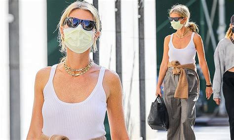 Gwyneth Paltrow Looks Chic In White Vest Top And Trousers Daily Mail