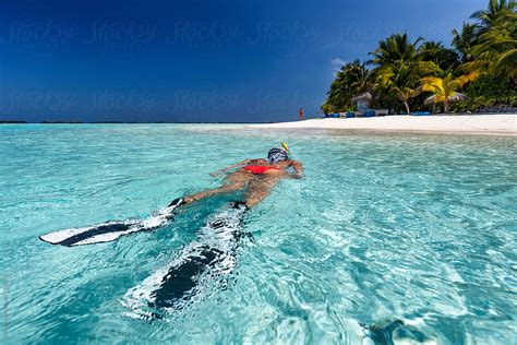Asian Woman Snorkelling In Maldives Del Colaborador De Stocksy Jino