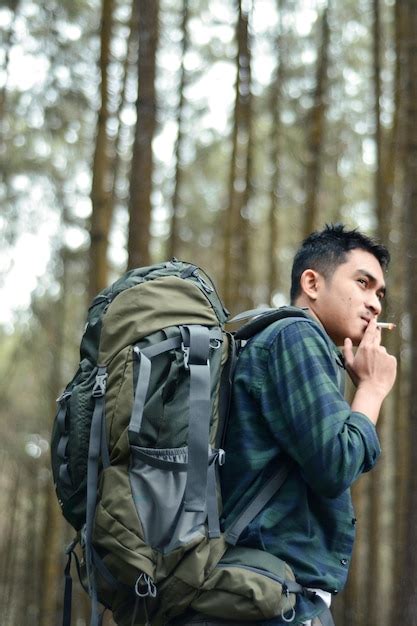 Premium Photo Enjoy A Cigarette In The Pine Forest