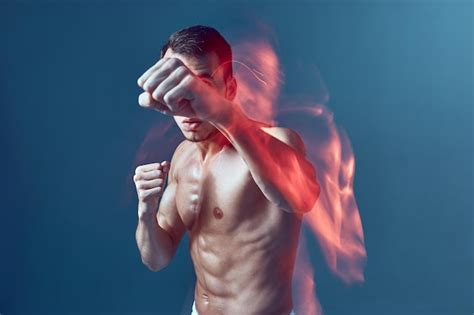 Premium Photo Sports Male With Muscular Naked Torso Boxing With Clenched Fists Raised Arms