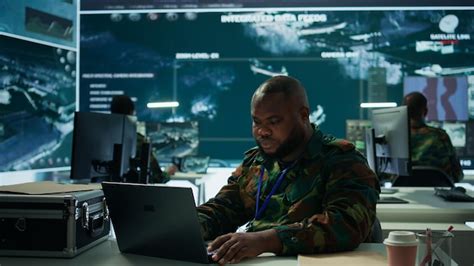 Premium Photo Military Intelligence Specialist Uses High Tech Satellite Systems And Cctv Radar