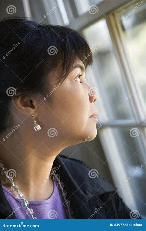Woman Gazing Out Window Stock Image Image Of Pensive 8497725
