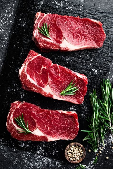Raw Beef Steak On Black Background With Cooking Ingredients Fresh Beef
