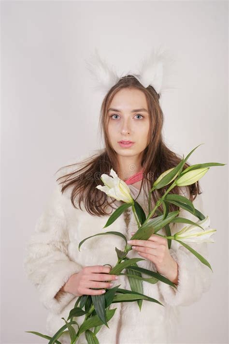 Cute Young Teen Girl Standing In A Winter Warm Fur Coat And Cat Furry