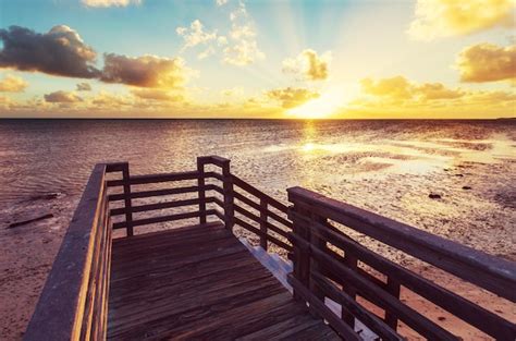 Premium Photo Wooden Boardwalk On The Beach