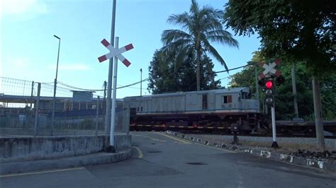 Ktmb Class 25 Passing Railway Crossing At Penang Sentralbutterworth